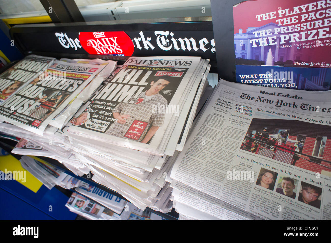 New York daily newspapers report on the mass shooting in a theater in ...