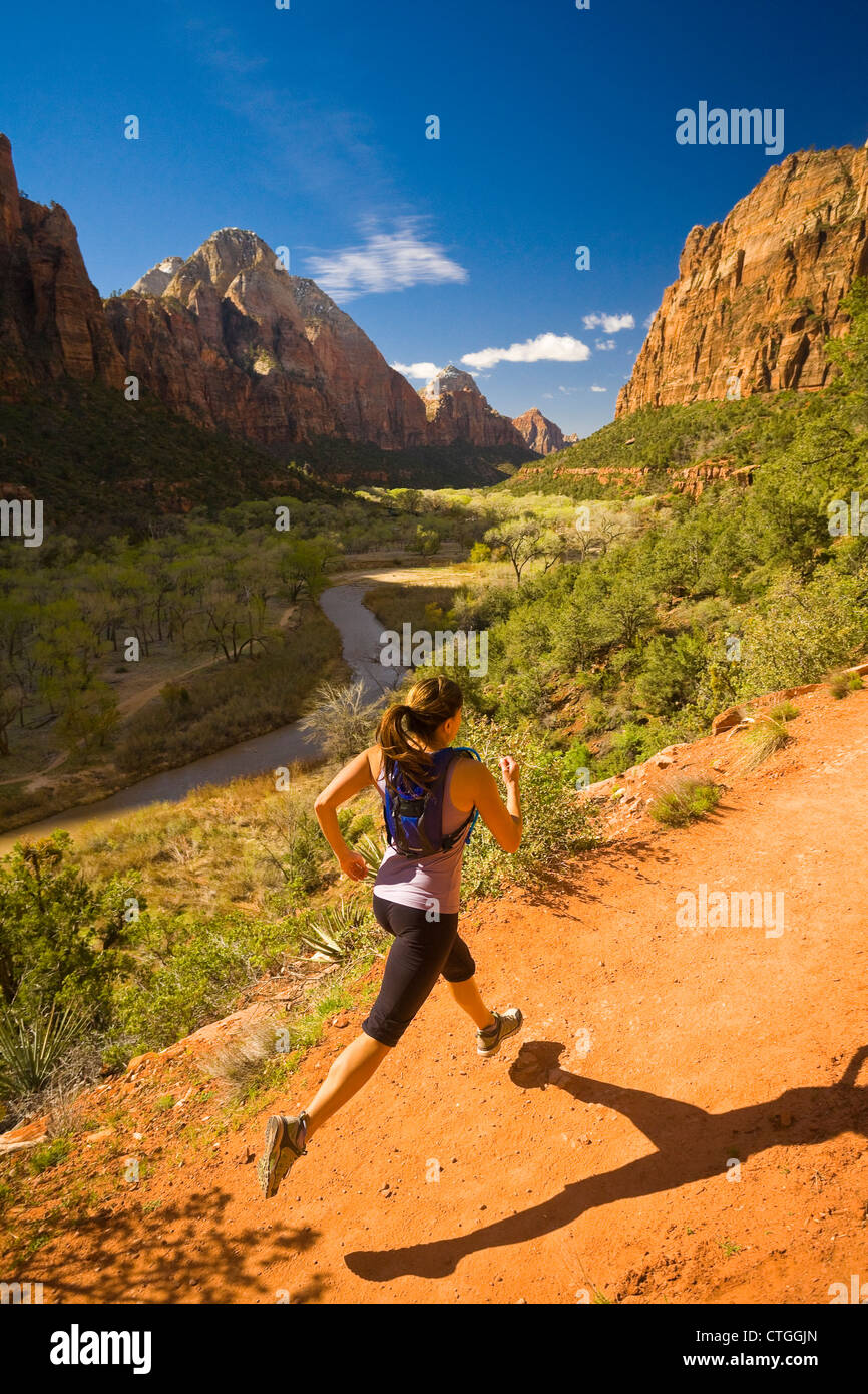 Persian woman running in canyon Stock Photo - Alamy