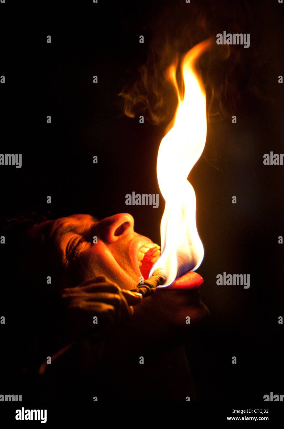 Fire eating man in Kandy, Sri Lanka Stock Photo - Alamy
