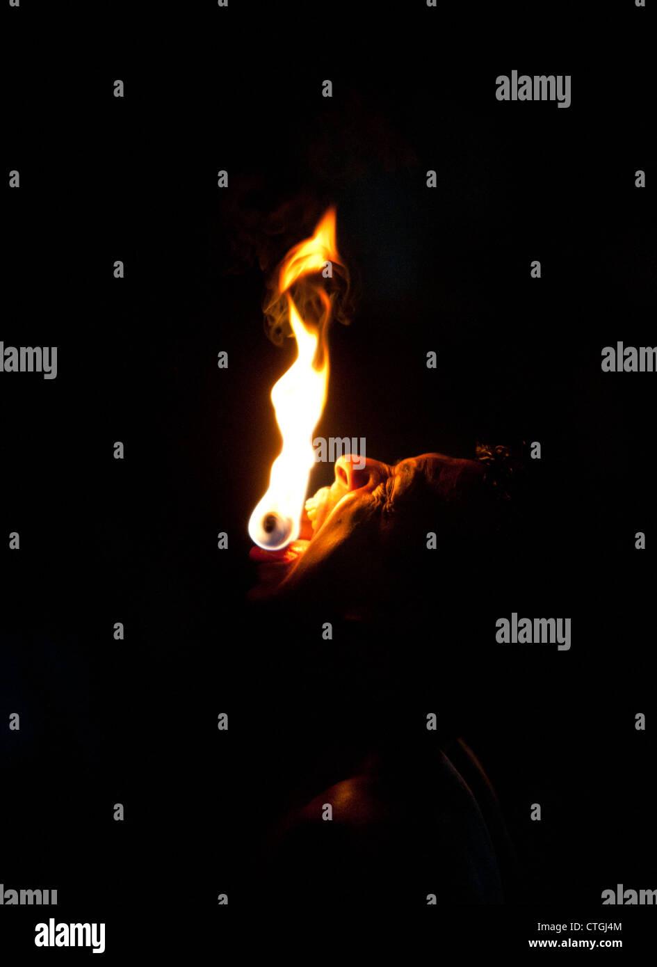 Fire eating man in Kandy, Sri Lanka Stock Photo - Alamy