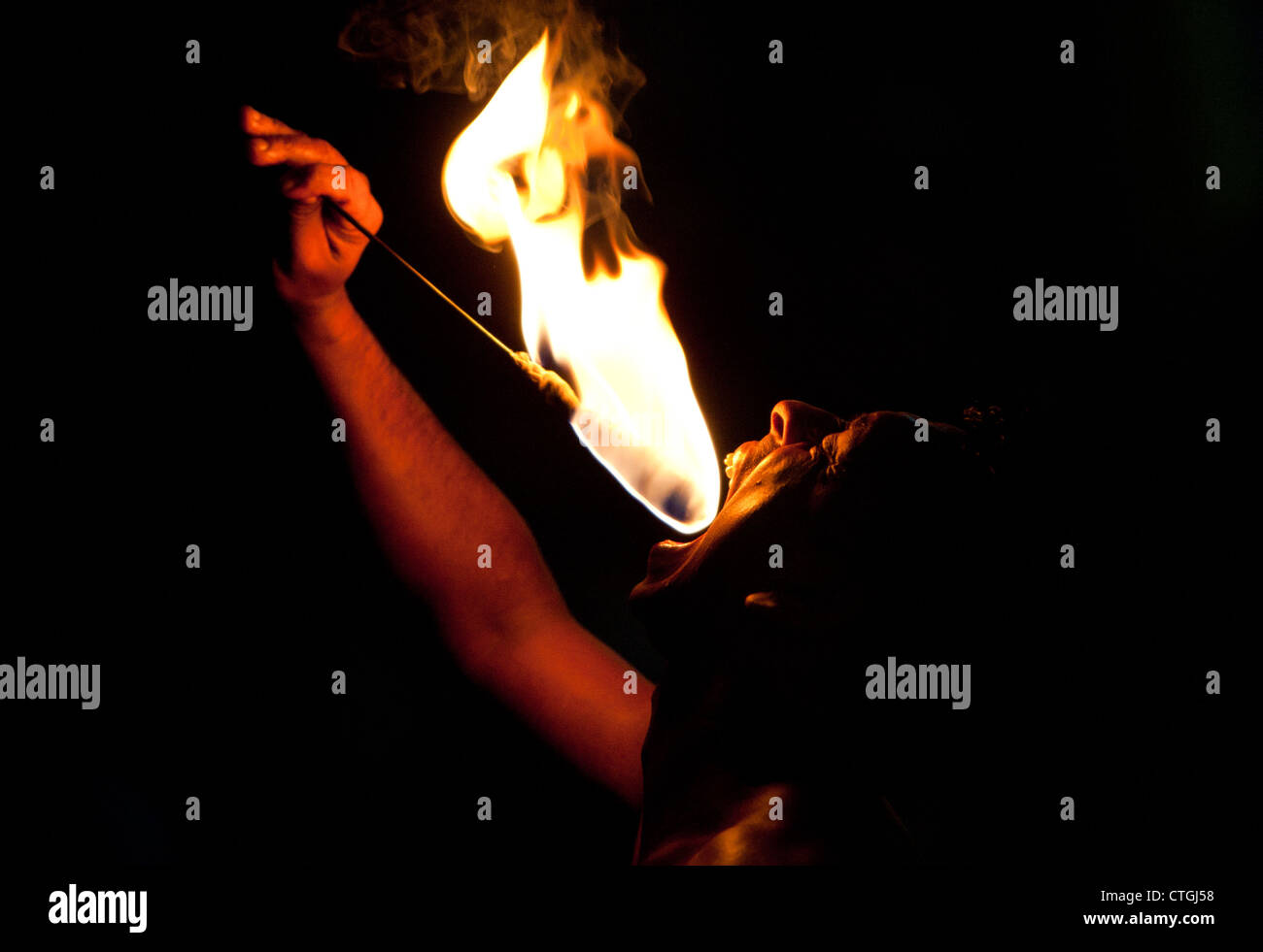 Fire eating man in Kandy, Sri Lanka Stock Photo - Alamy