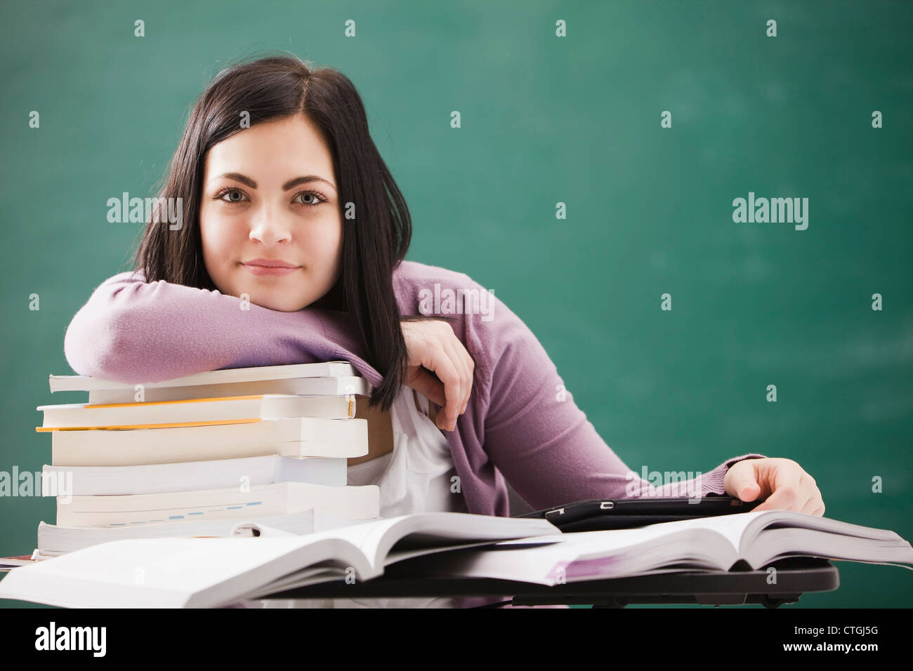 Caucasian student doing homework Stock Photo - Alamy