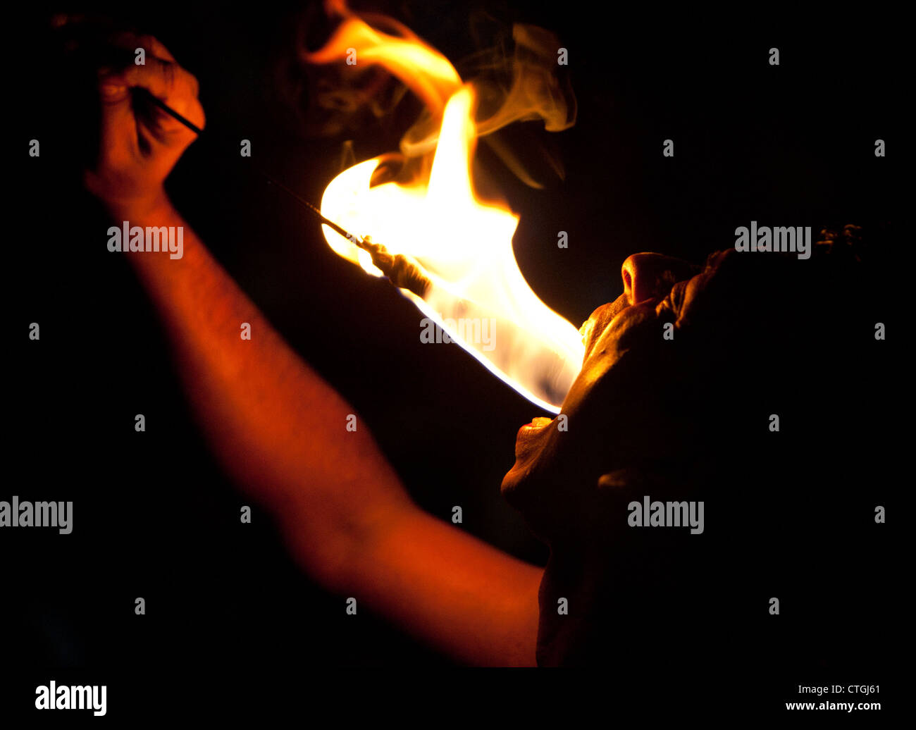 Fire eating man in Kandy, Sri Lanka Stock Photo - Alamy