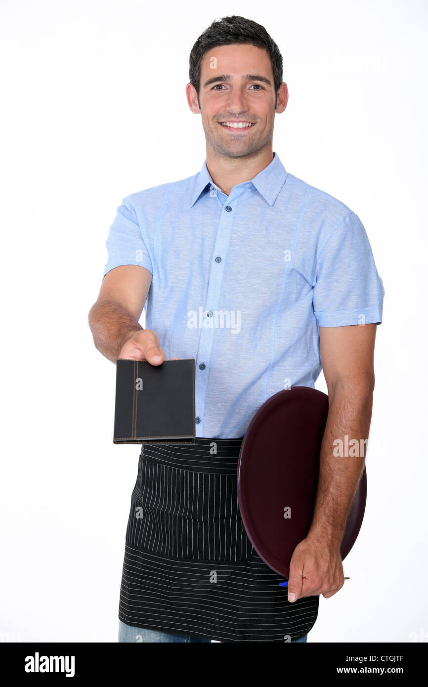 Waiter offering menu Stock Photo - Alamy