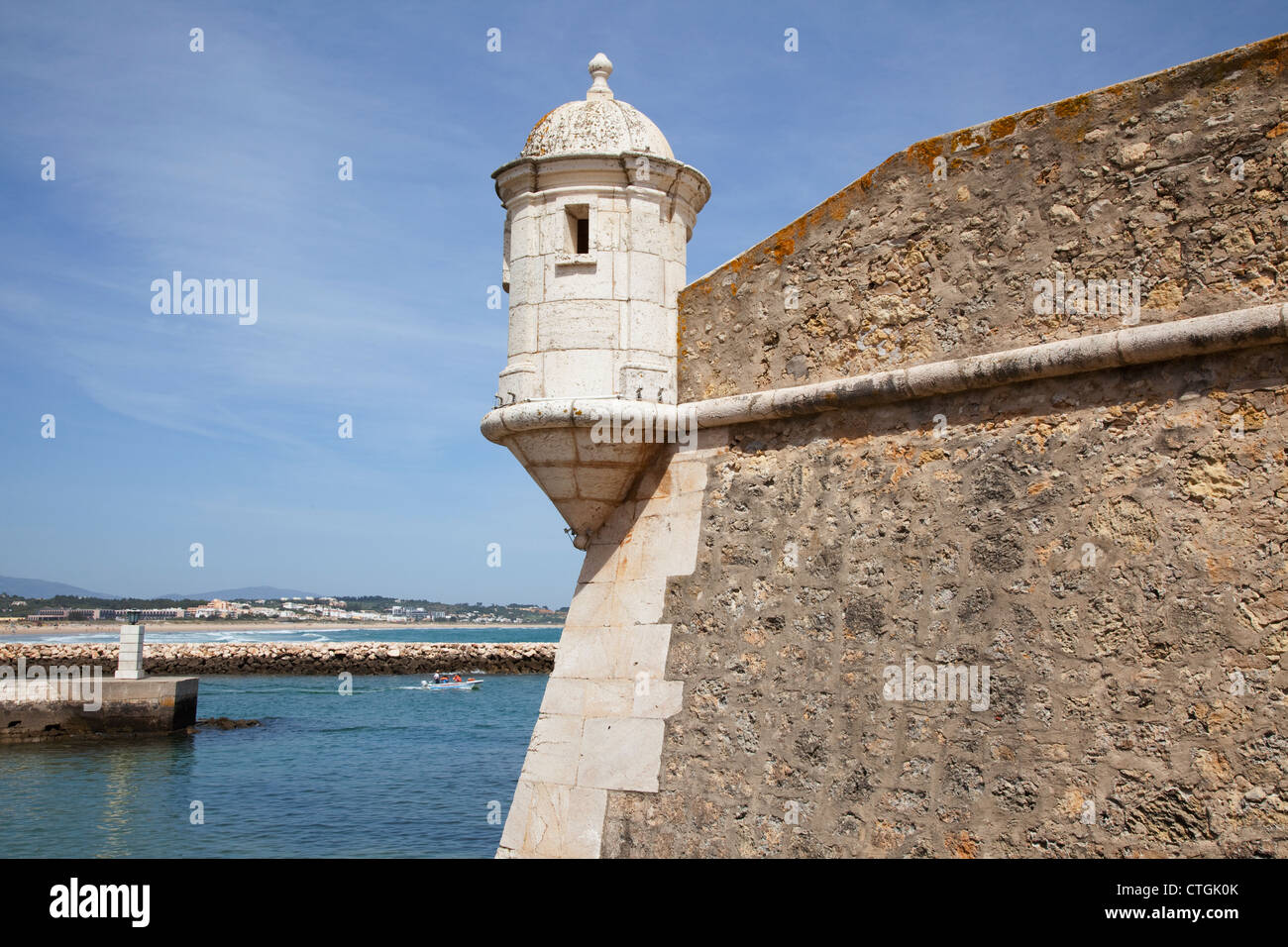 A Lookout Posted In The Corner Of A Stone Wall On The Water's Edge ...