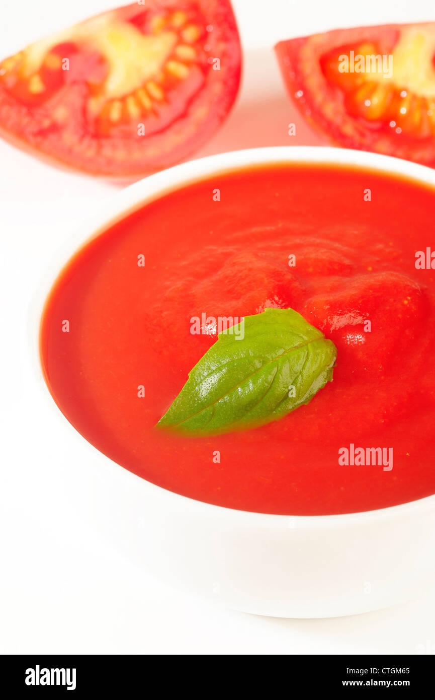 fresh red tomato sauce with basil leaf Stock Photo - Alamy