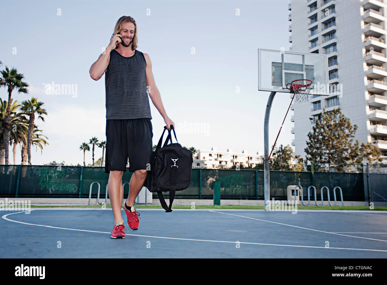 Man carrying basketball hi-res stock photography and images - Alamy