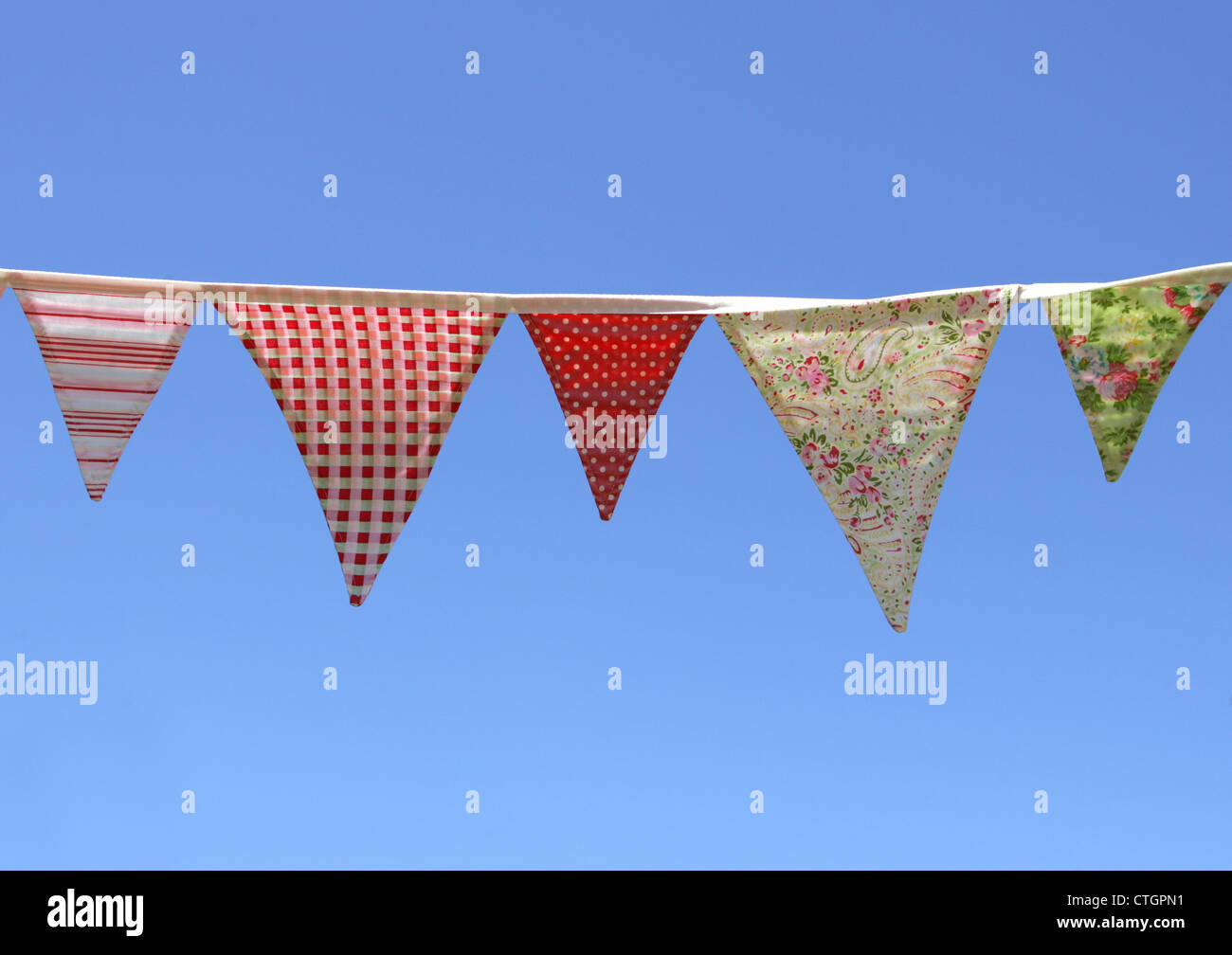 Country Bunting on blue sky Stock Photo - Alamy