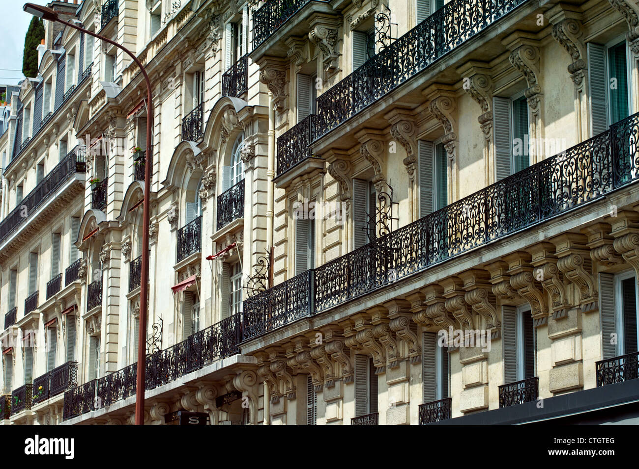 Traditional facade and balconys of parisian architecture Stock Photo ...