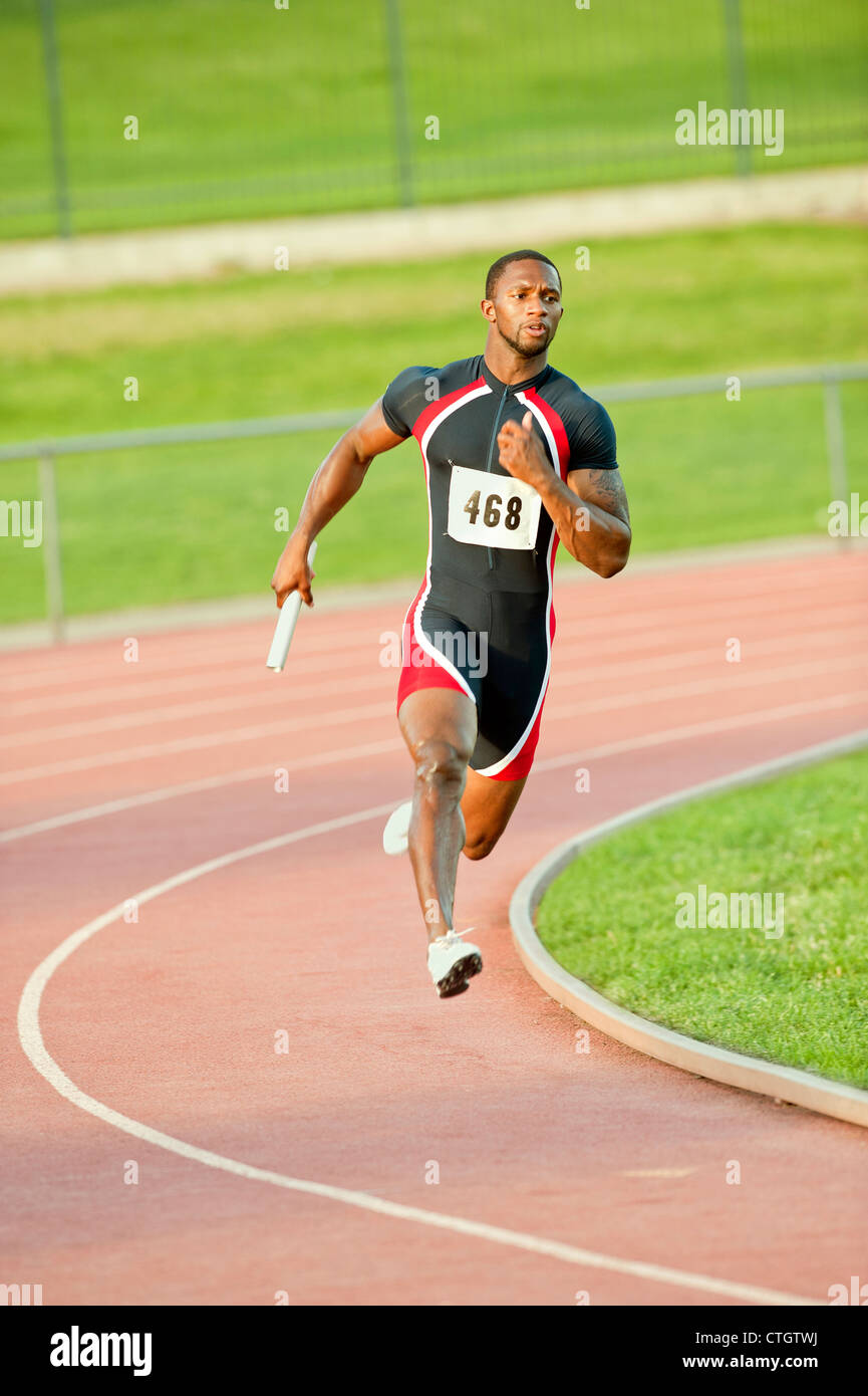 Athlete Relay Baton High Resolution Stock Photography and Images - Alamy