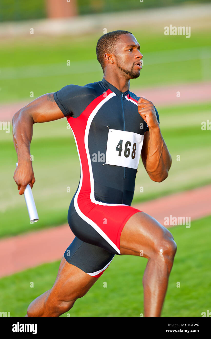 Relay runner hi-res stock photography and images - Alamy