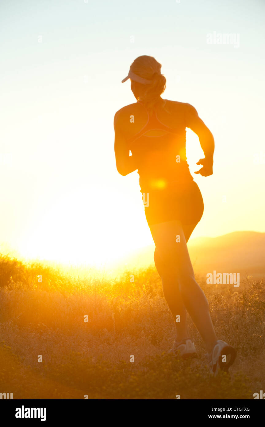 Running woman silhouette hi-res stock photography and images - Alamy