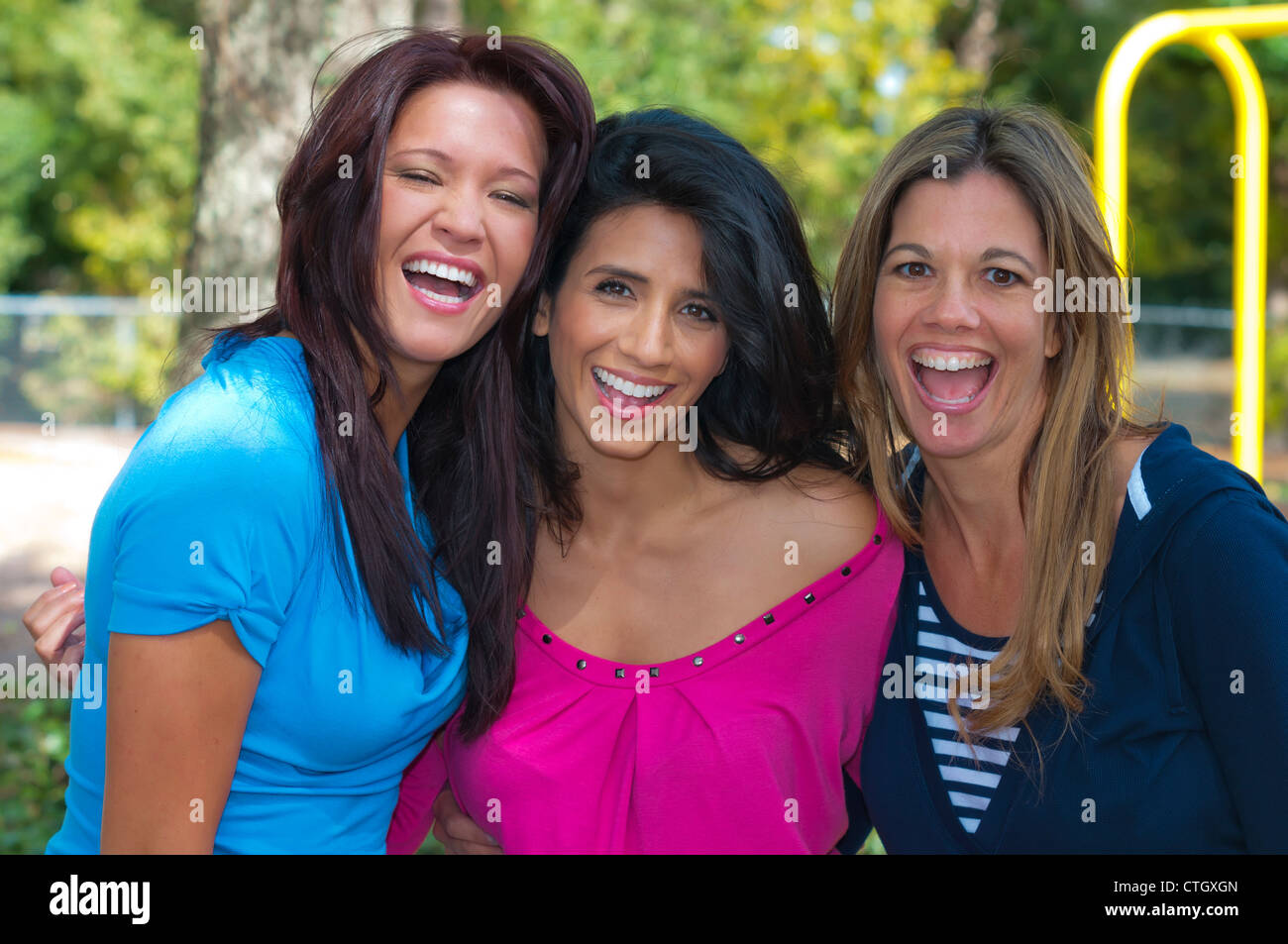 Attractive young women smiling and having fun Stock Photo - Alamy