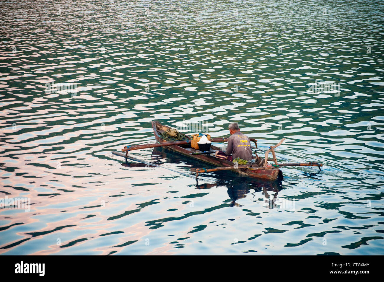 Outrigger fisherman paddling hi-res stock photography and images - Alamy