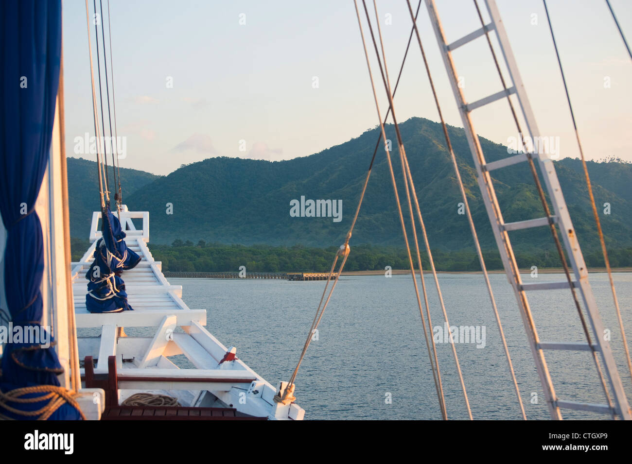 The Pinisi schooner, Ombak Putih, anchors off of Komodo Island ...
