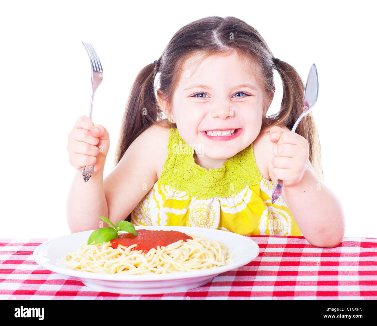 Beautiful girl eating pasta isolated on white Stock Photo - Alamy