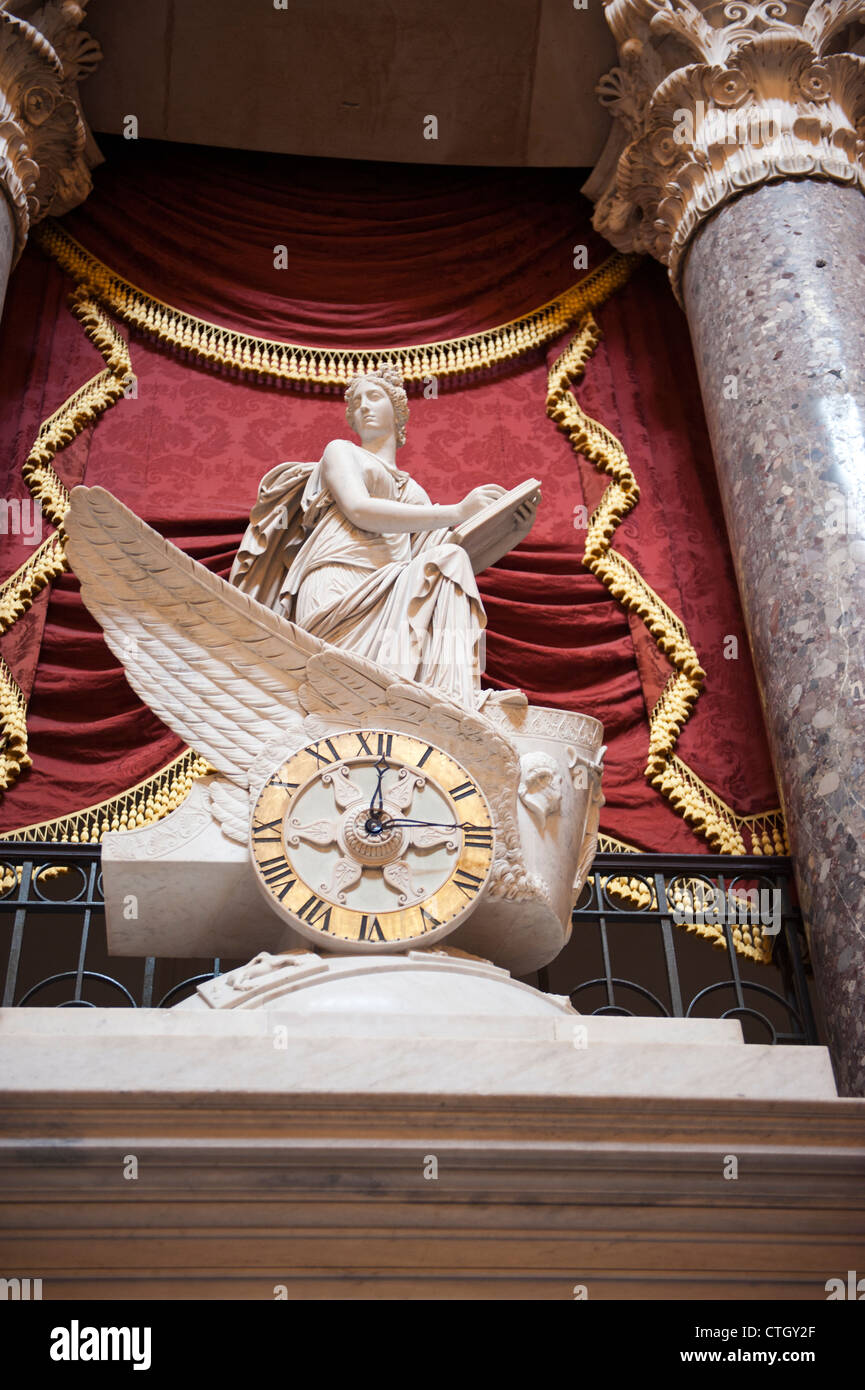 Clock above doorway in the hall of statues in the US Capitol Building ...