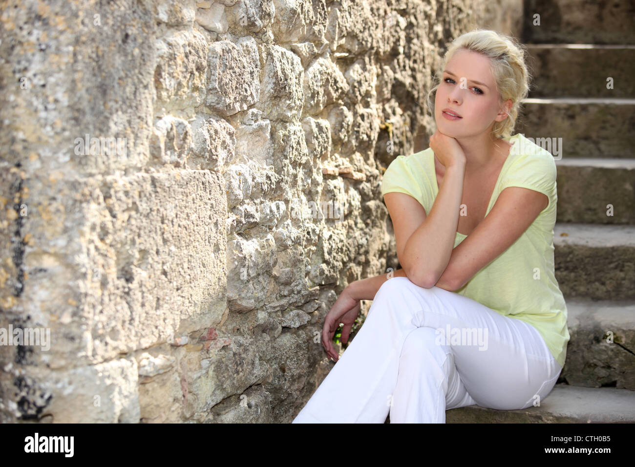 sitting on step Stock Photo - Alamy