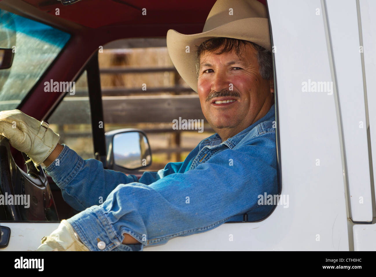 Hispanic man driving truck hi-res stock photography and images - Alamy