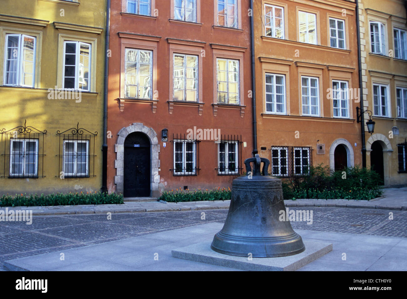 Bronze bell in Kanonia Square, Old Town, Warsaw, Poland Stock Photo - Alamy