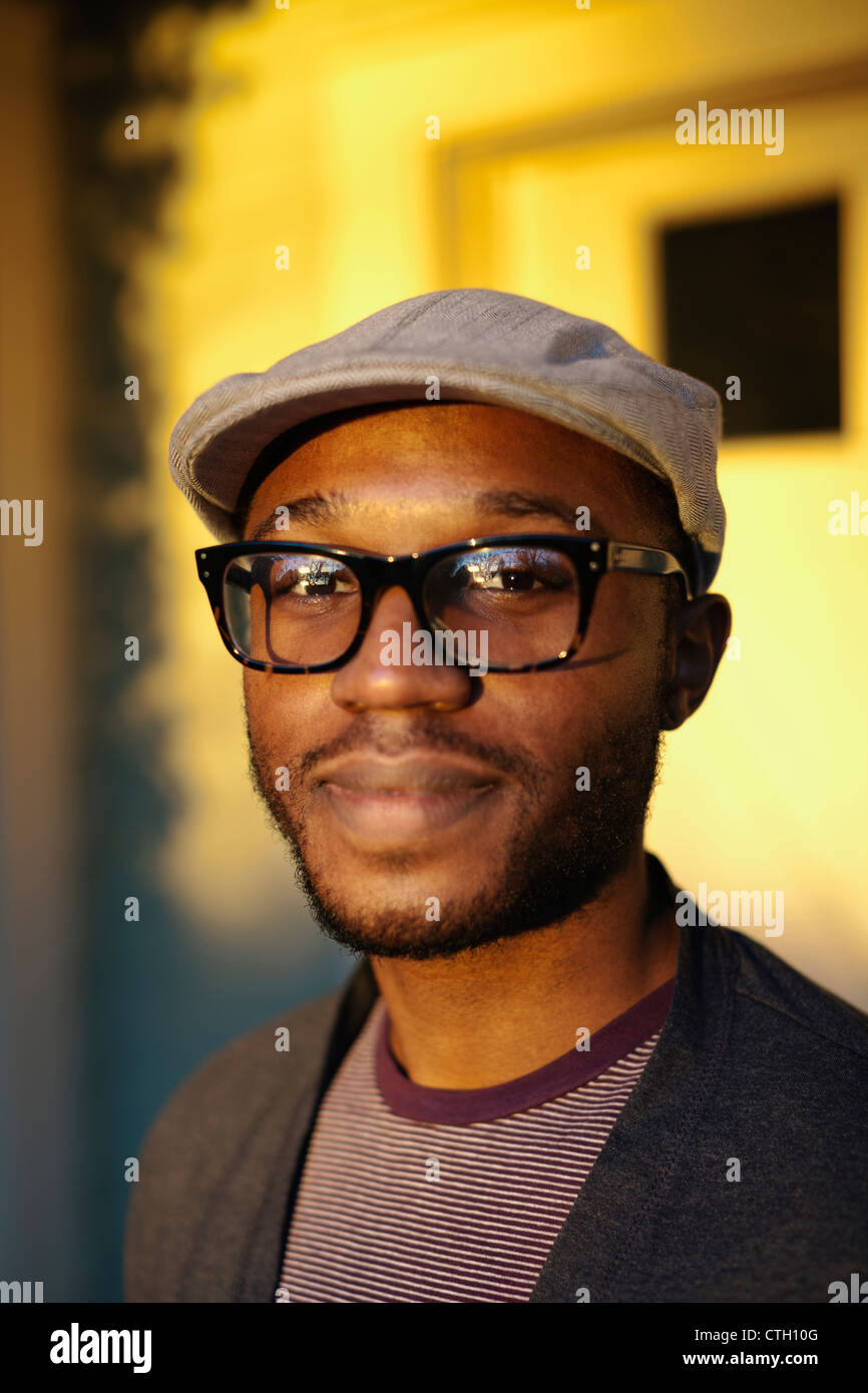 Smiling Black man standing outdoors Stock Photo - Alamy