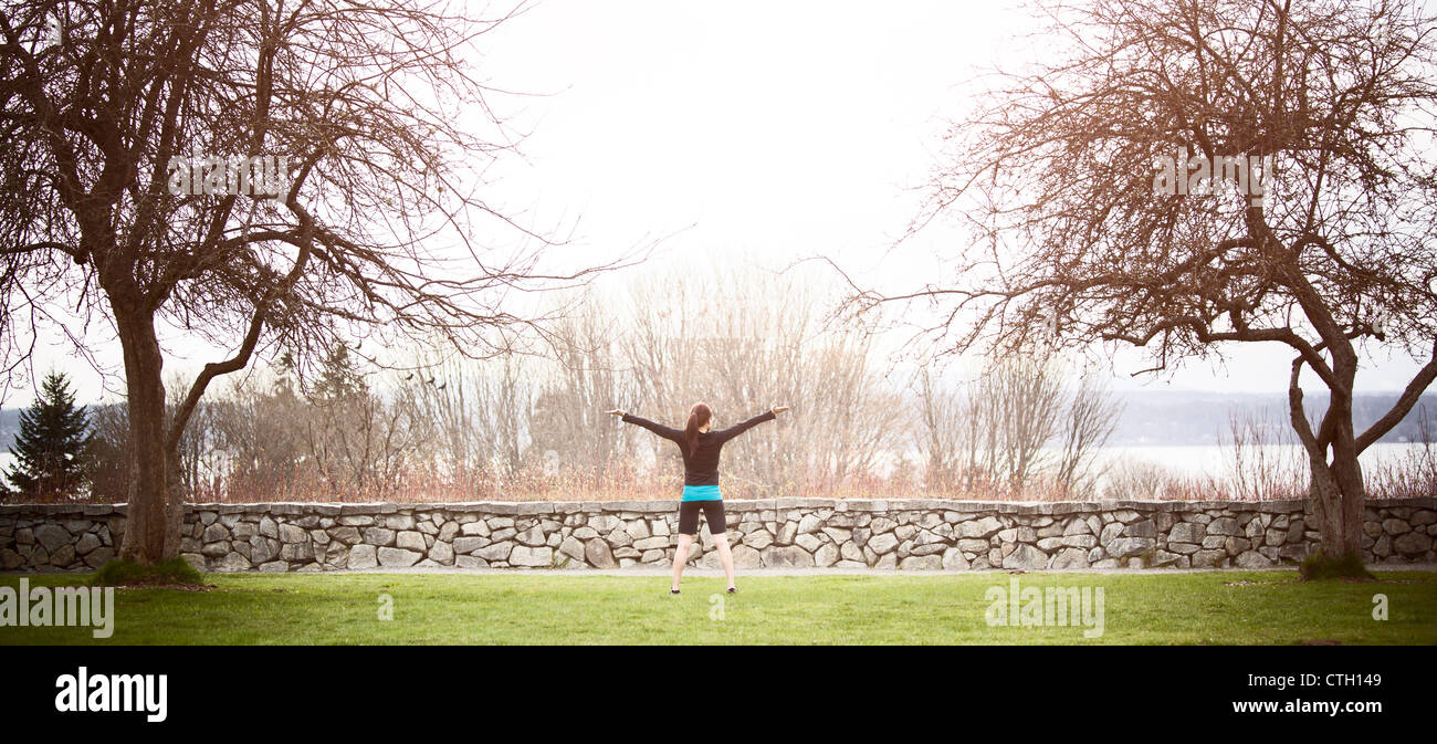 Asian woman exercising in park Stock Photo - Alamy