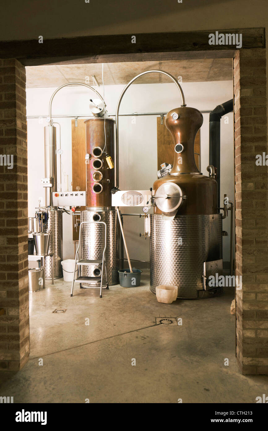 The new distillitor is driven by a wood fire Stock Photo - Alamy