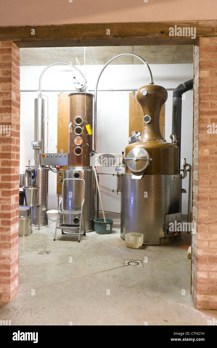 The new distillitor is driven by a wood fire Stock Photo - Alamy