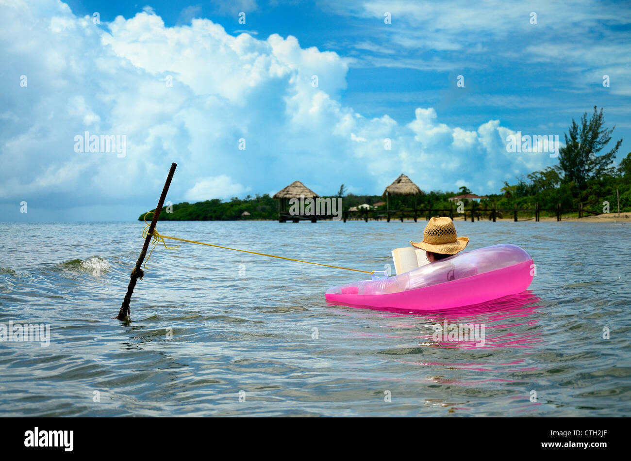 Woman Floating Reading Book High Resolution Stock Photography and ...