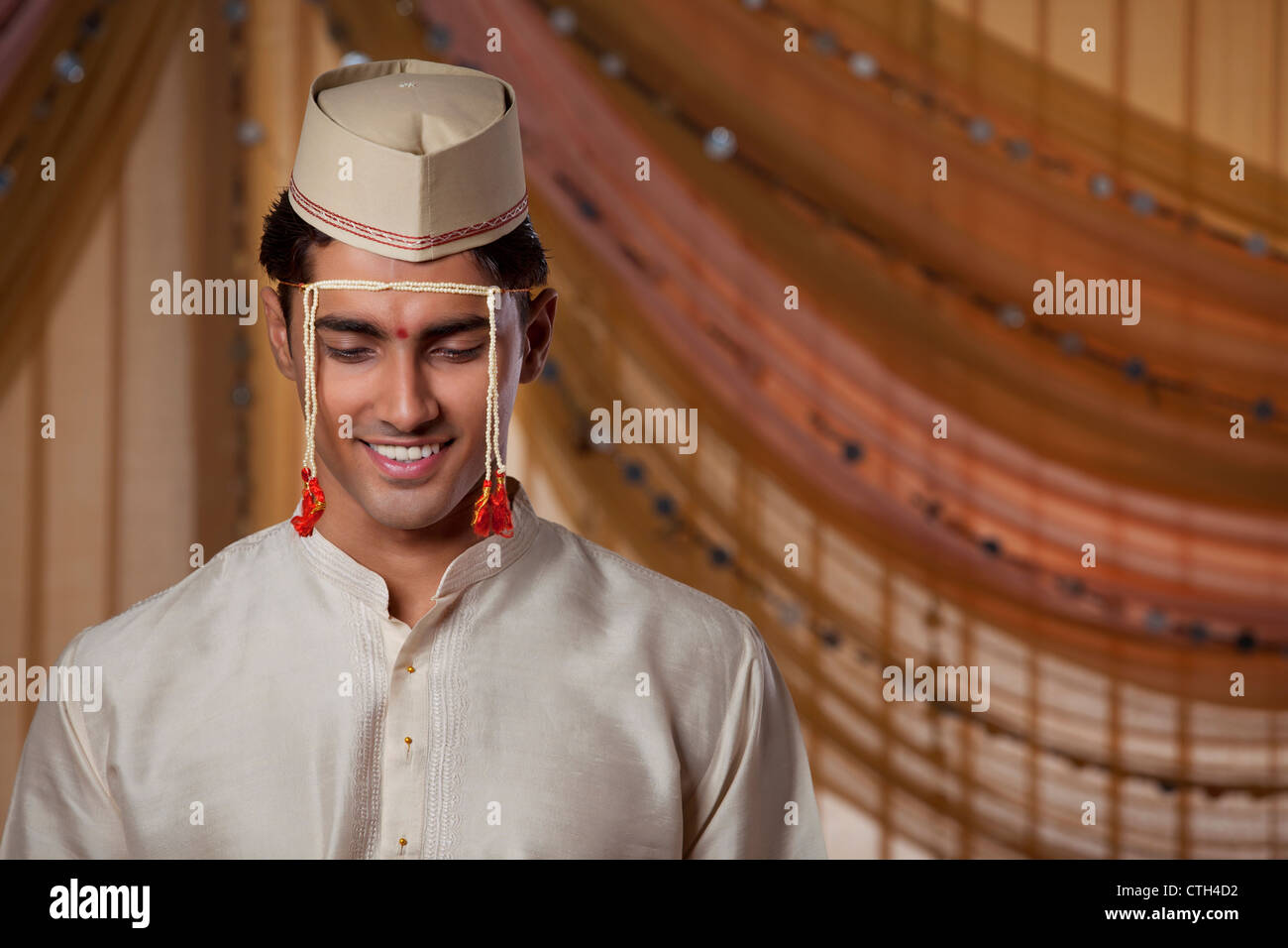 Young Indian groom smiling Stock Photo - Alamy