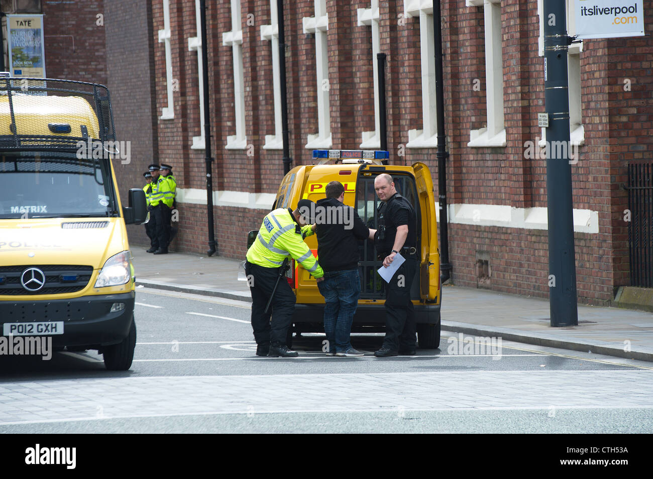 Far right supporter arrested and searched by police. James Larkin ...