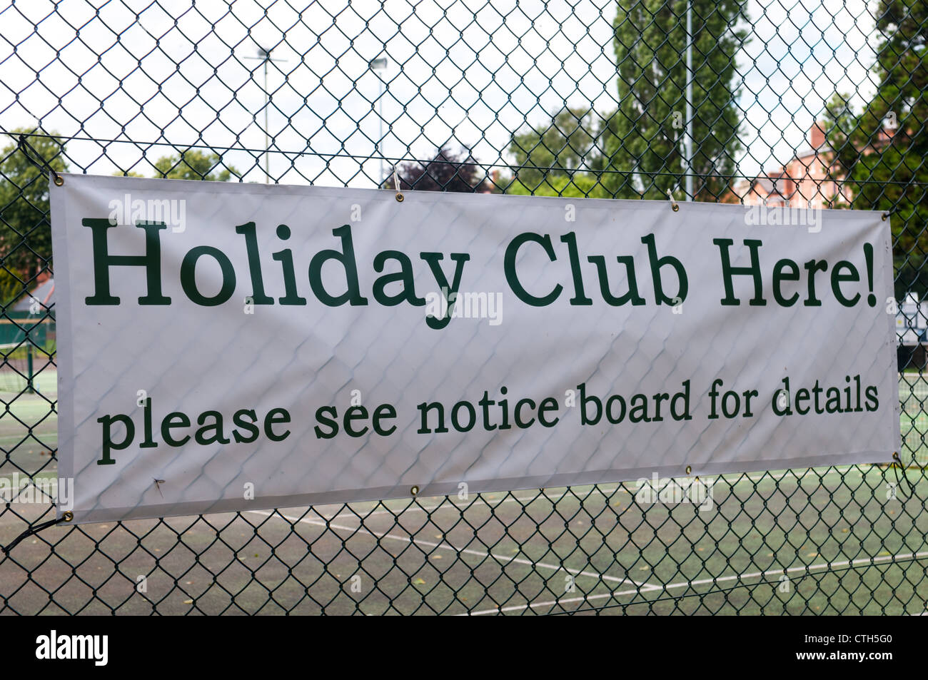 Holiday Club Here! sign Stock Photo - Alamy