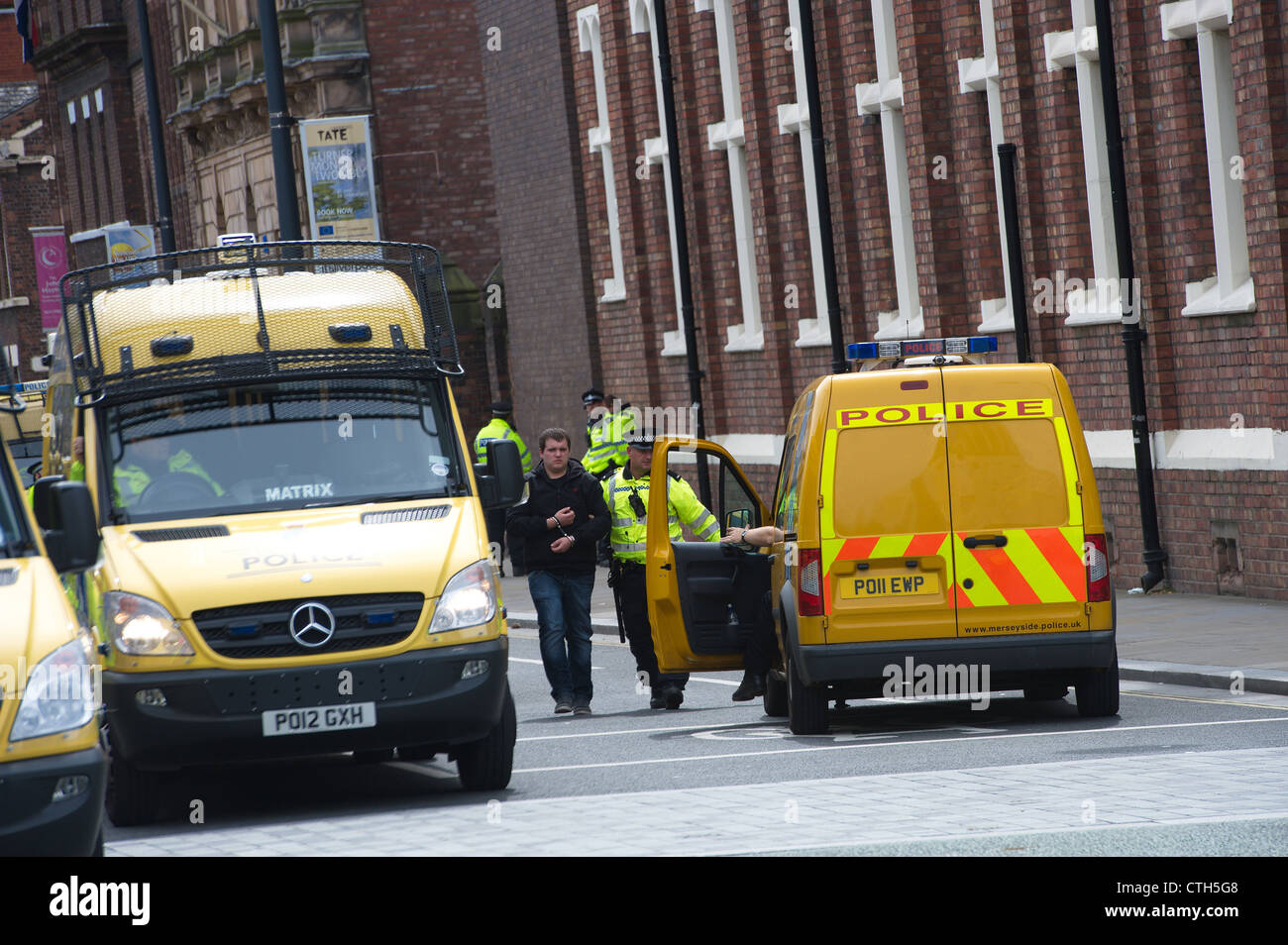 Man arrested and in handcuffs during James Larkin Society of Liverpool ...