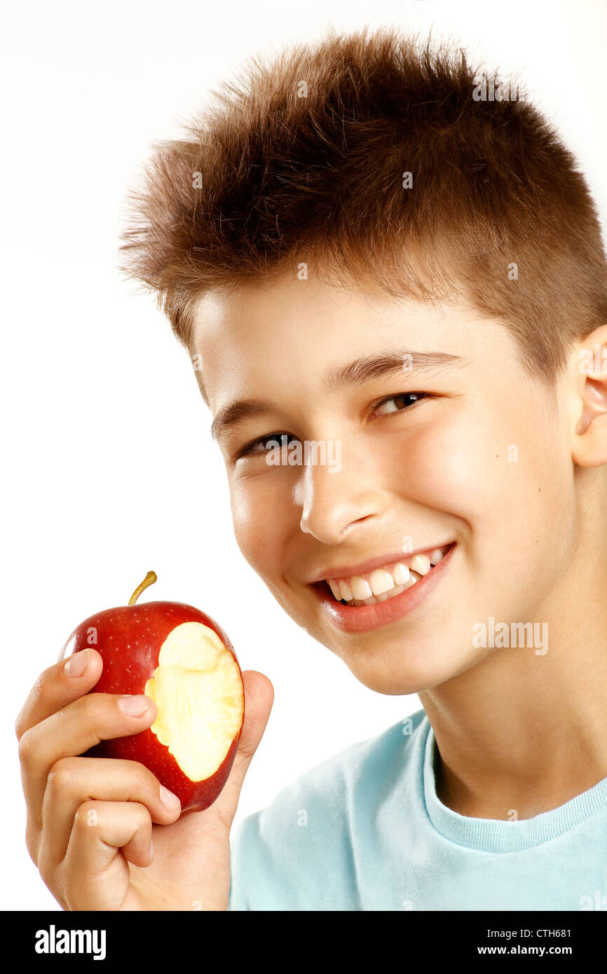 boy eat apple on white Stock Photo - Alamy