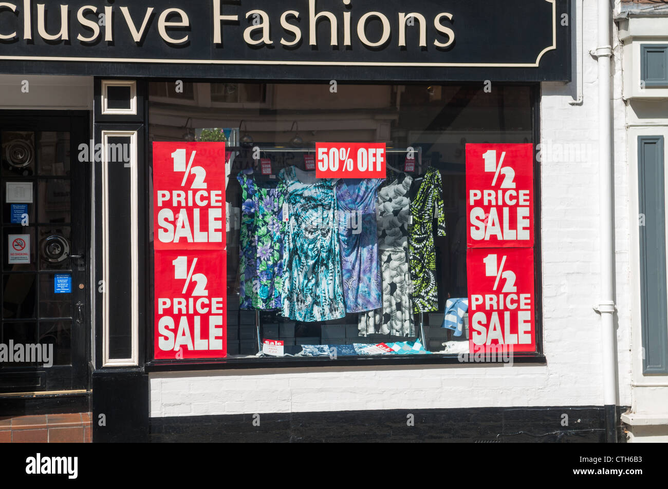 Fashion shop half price sale Stock Photo - Alamy