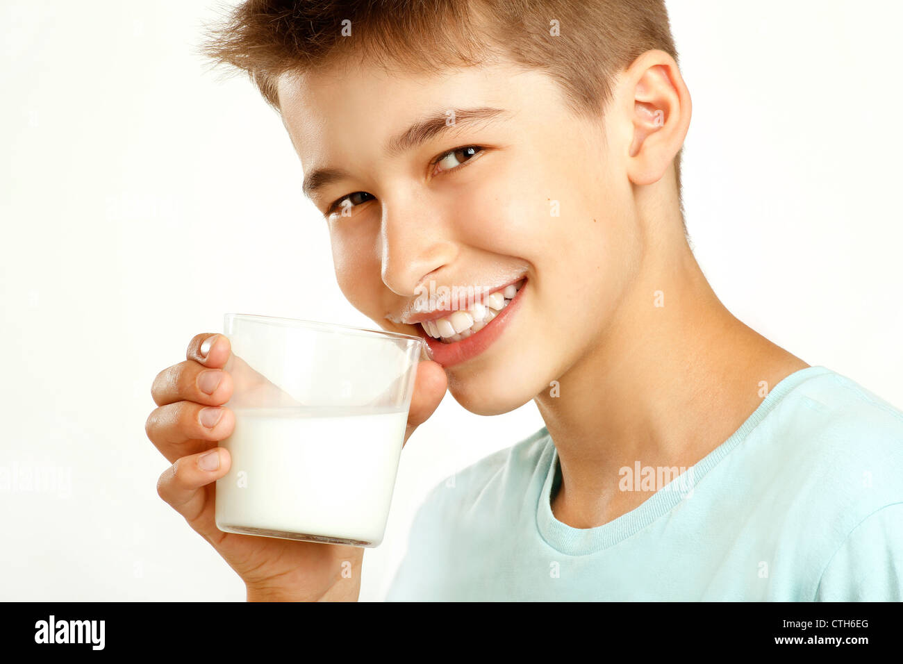 boy drink milk on white Stock Photo - Alamy