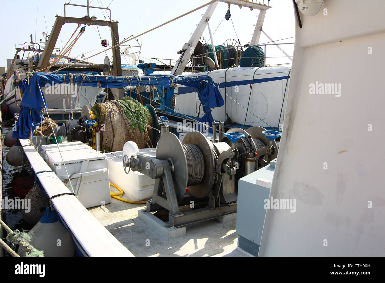 Engines to bring the nets on fishing vessels Stock Photo - Alamy