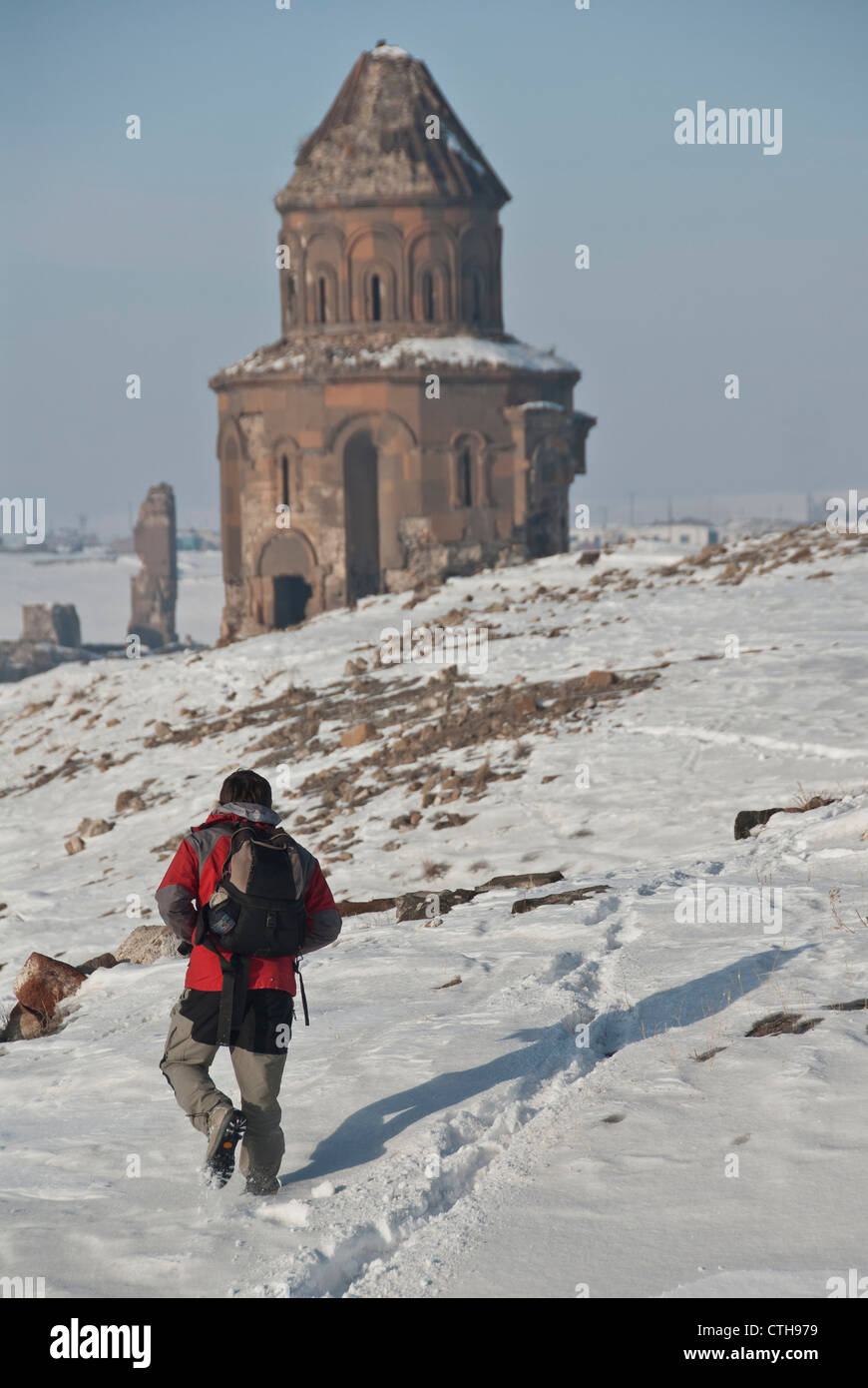 Person walking at the Ancient Ruins Of Ani at winter time, Kars ...