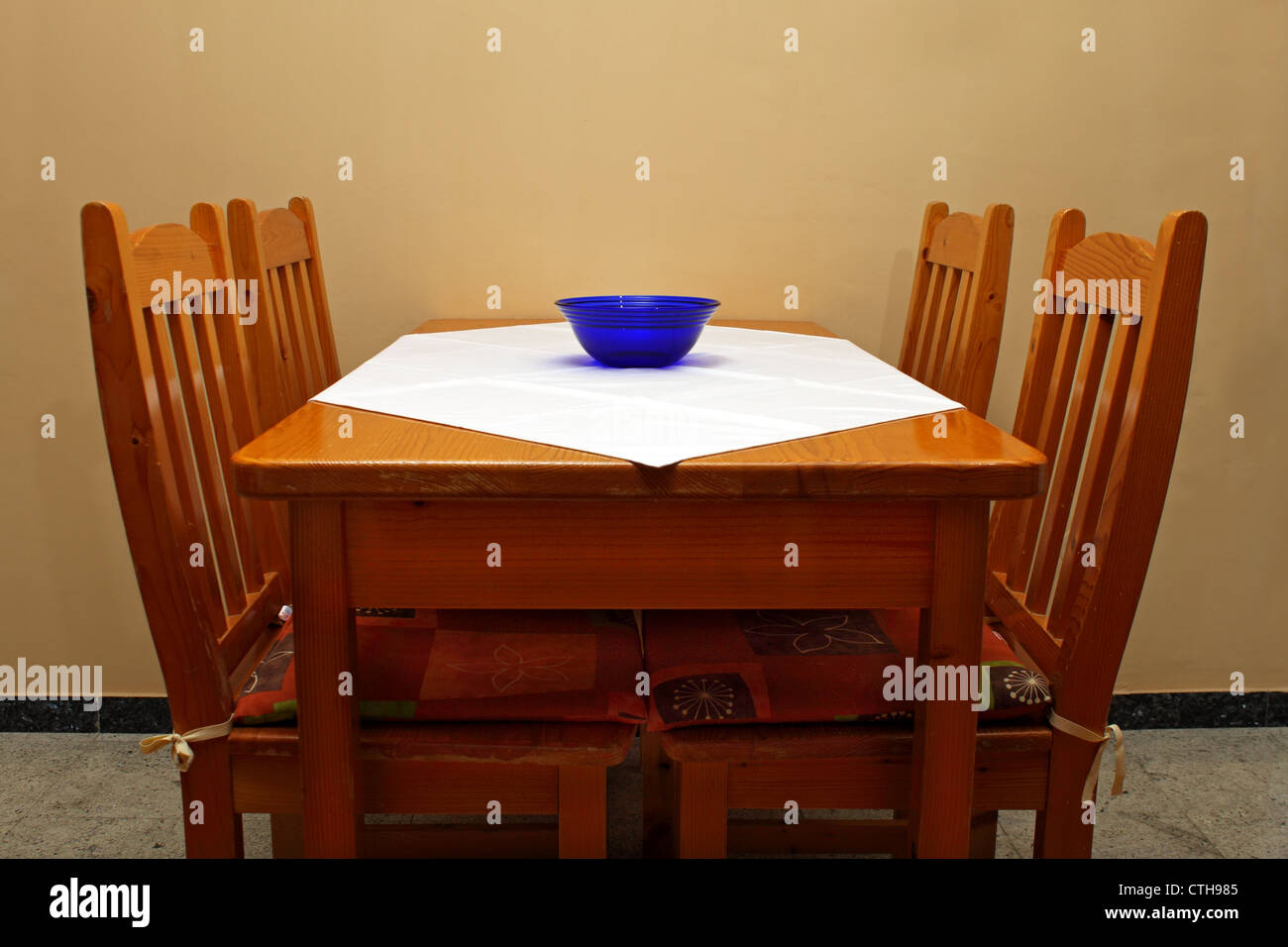 Rustic old dining room table and chairs Stock Photo - Alamy