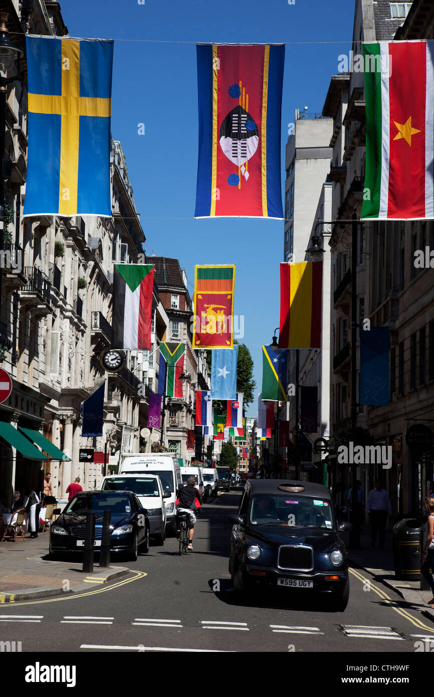 Flags of the World hang across Jermyn Street in the West End of London ...