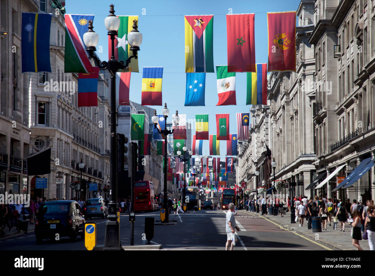 Flags of the World hang across Regent Street in the West End of London ...