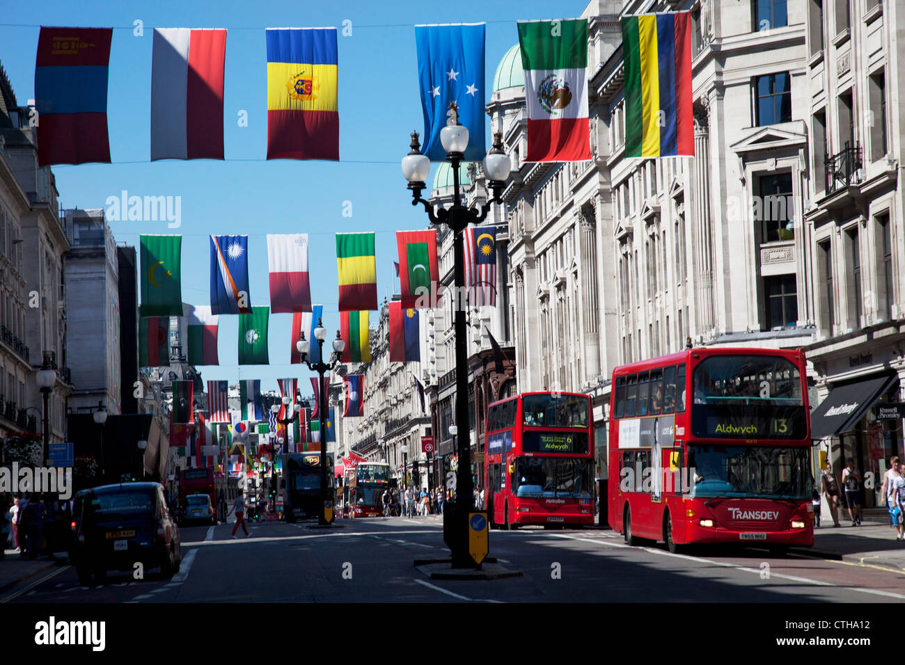 Flags of the World hang across Regent Street in the West End of London ...