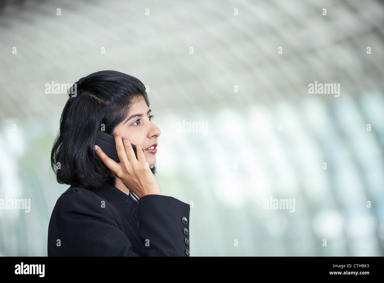 Indian using mobile High Resolution Stock Photography and Images - Alamy