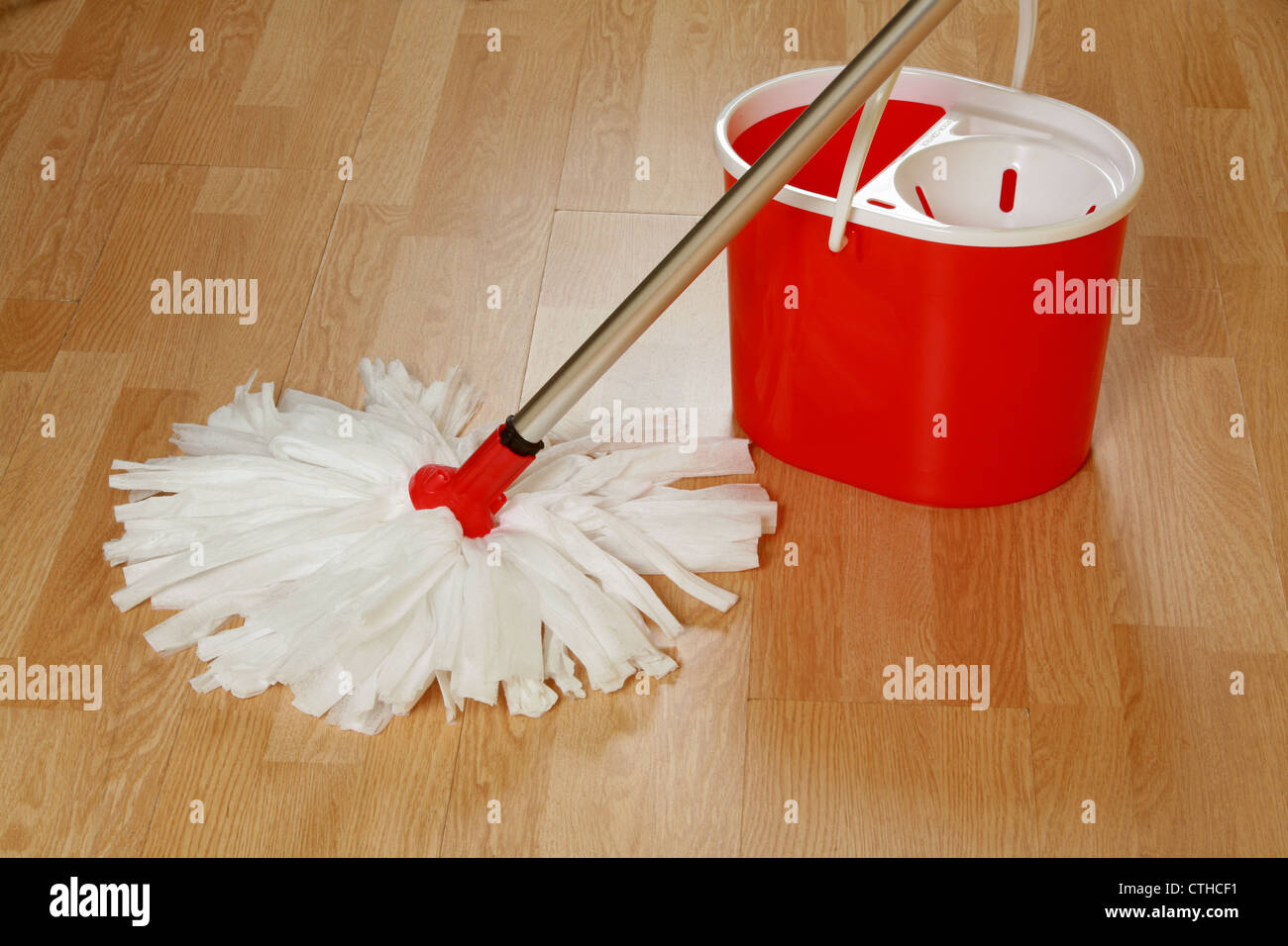 red mop and bucket Stock Photo - Alamy