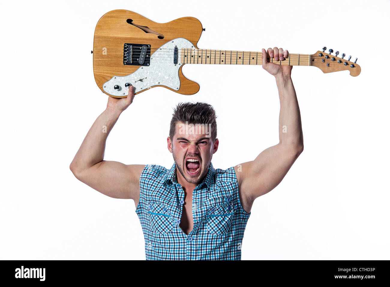 Rock musician with electric guitar Stock Photo - Alamy