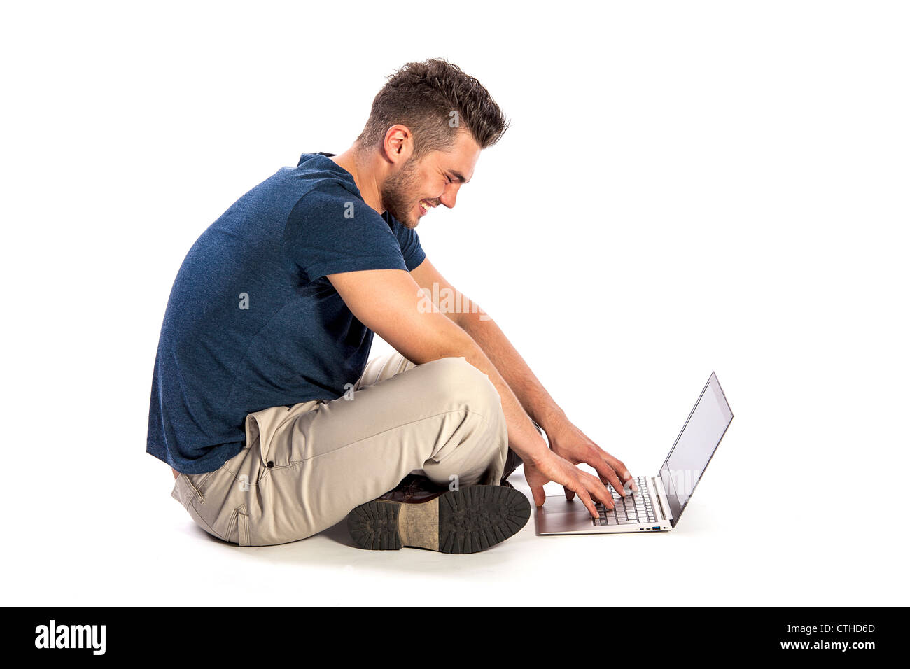 Young man with computer Stock Photo - Alamy