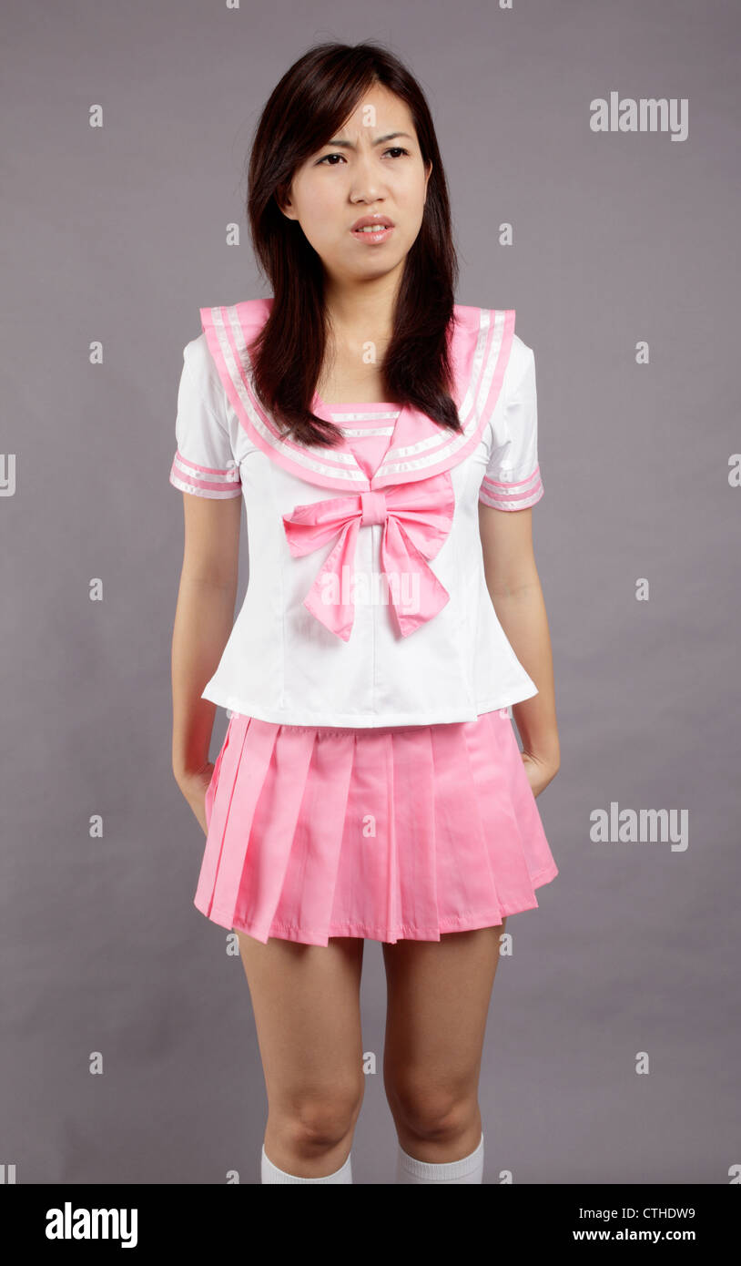 Portrait of school girl in pink skirt Stock Photo - Alamy