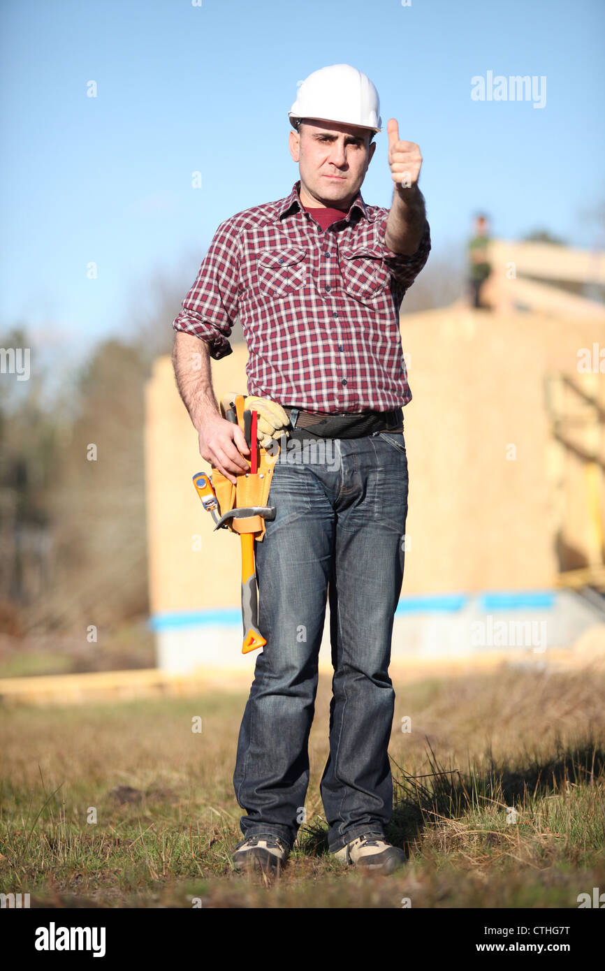 Foreman giving the thumbs-up Stock Photo - Alamy