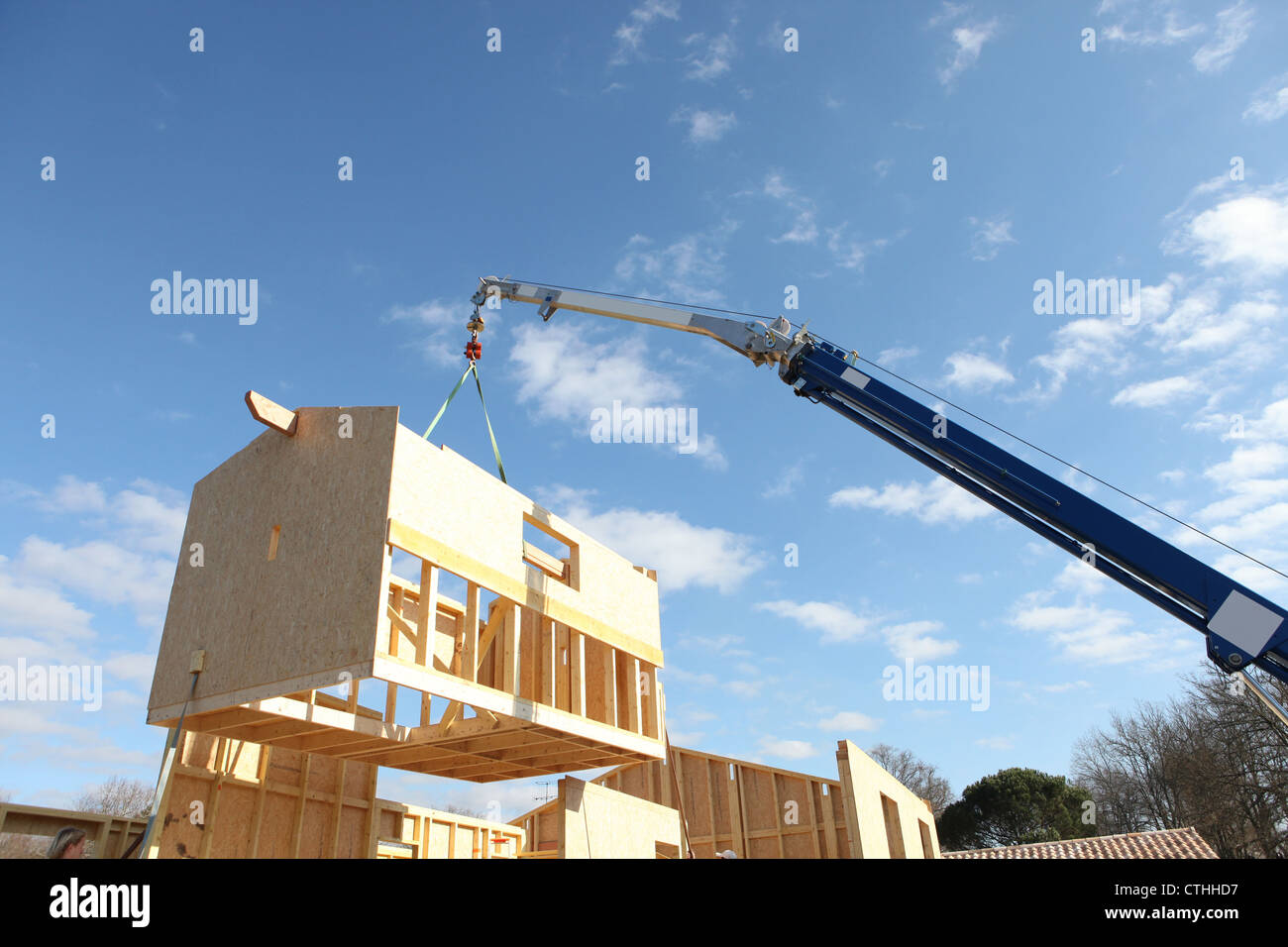 Crane lifting wooden frame hi-res stock photography and images - Alamy