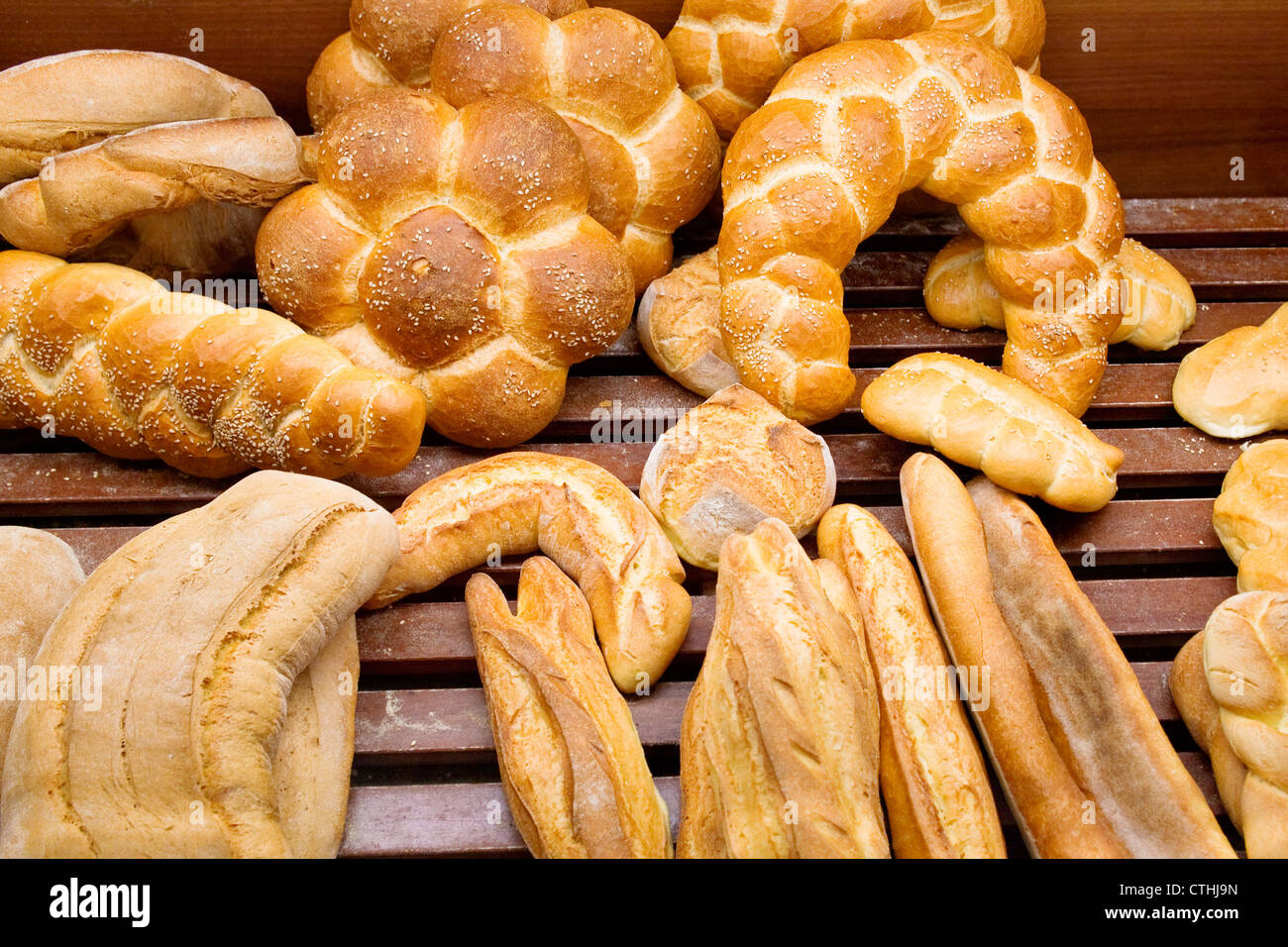 newly baked bread in baker's shop Stock Photo - Alamy